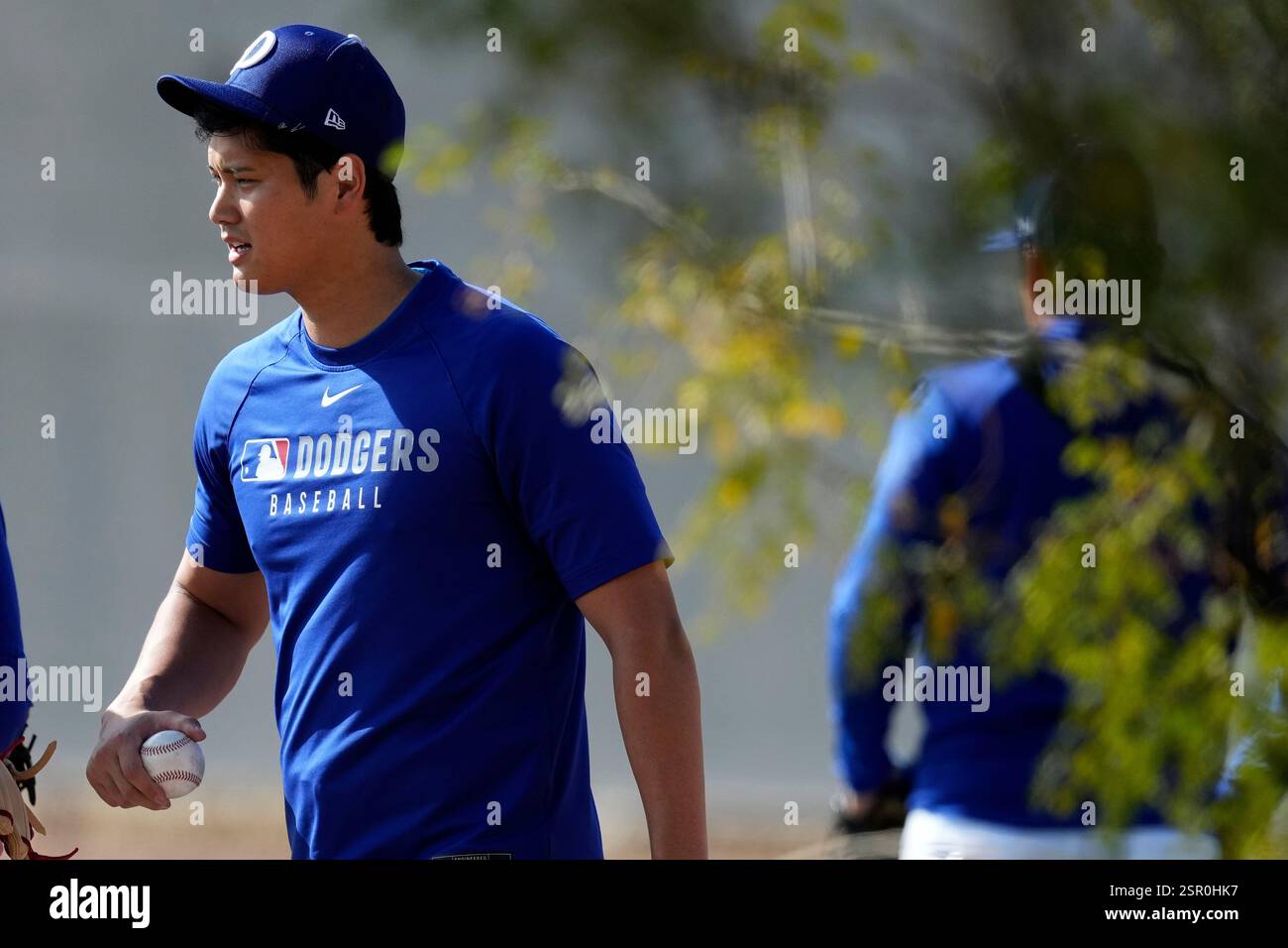 Los Angeles Dodgers' Shohei Ohtani, of Japan, runs drills during a ...