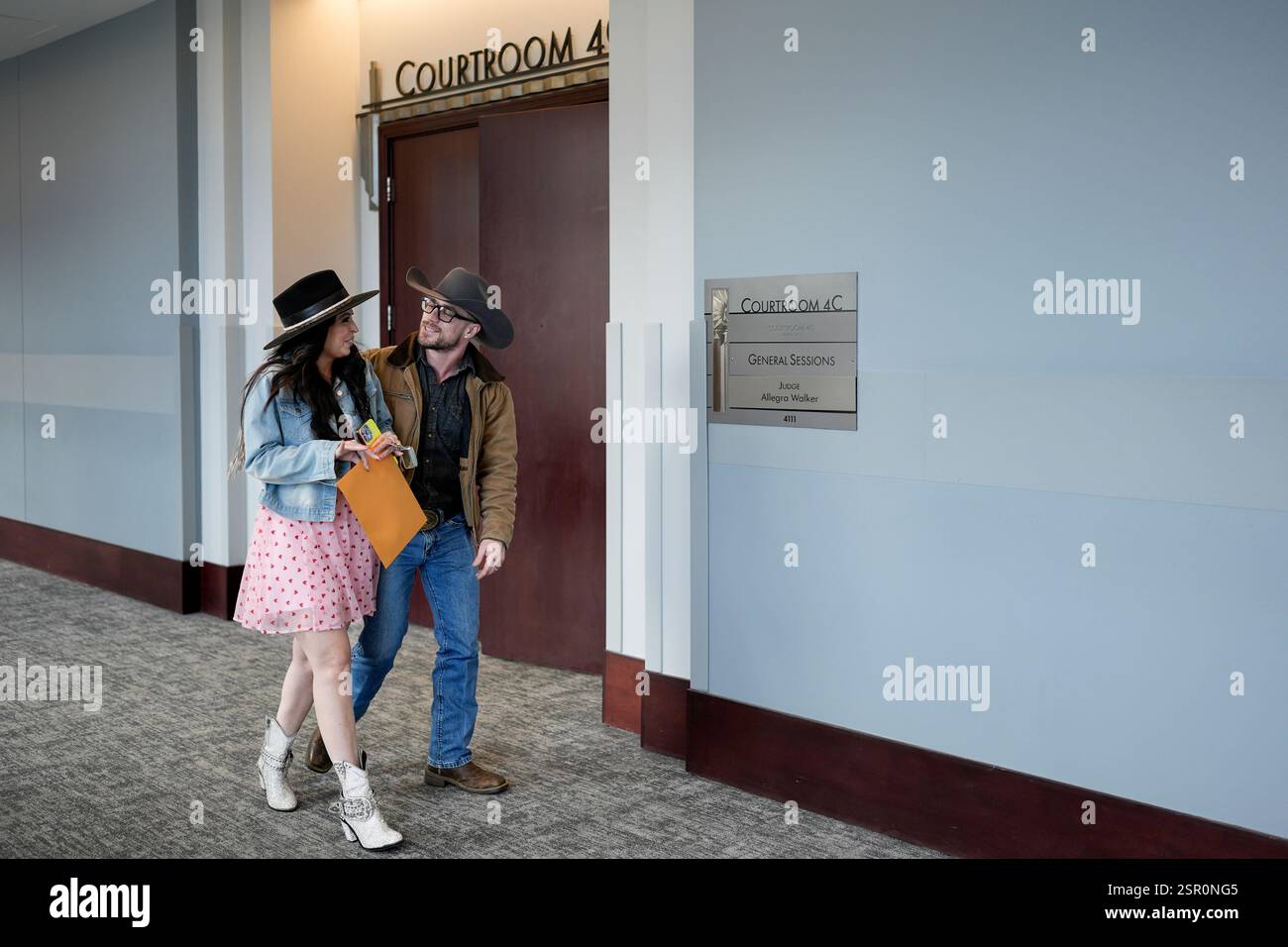 Crystal and Kurt Keebler leave a courtroom after their Valentines day ...