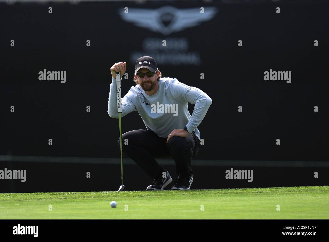 Patrick Rodgers lines up his putt on the 15th green of the South Course ...