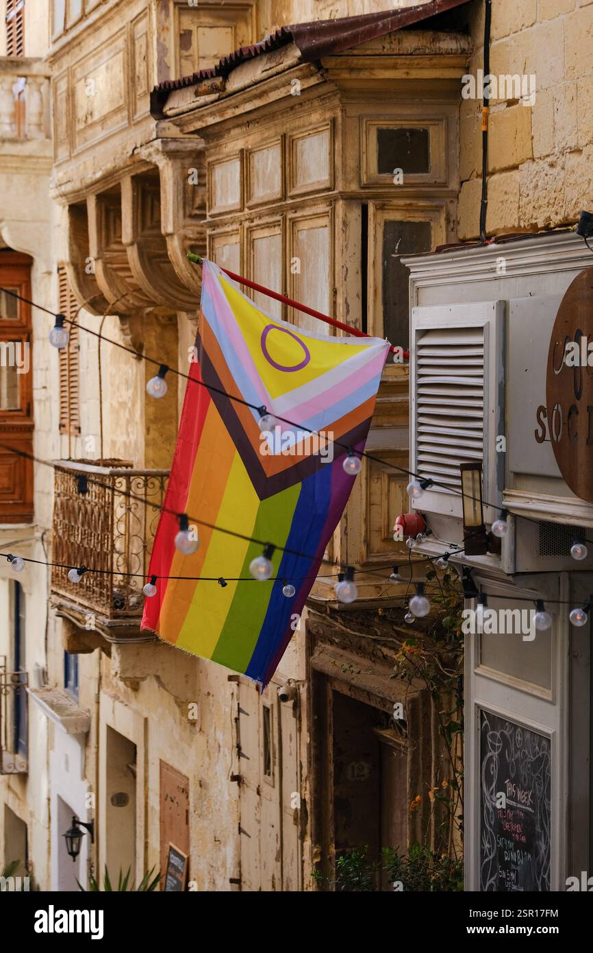 LGBTQ Pride Flag Displayed on Vintage Windows in Valletta, Malta Stock ...