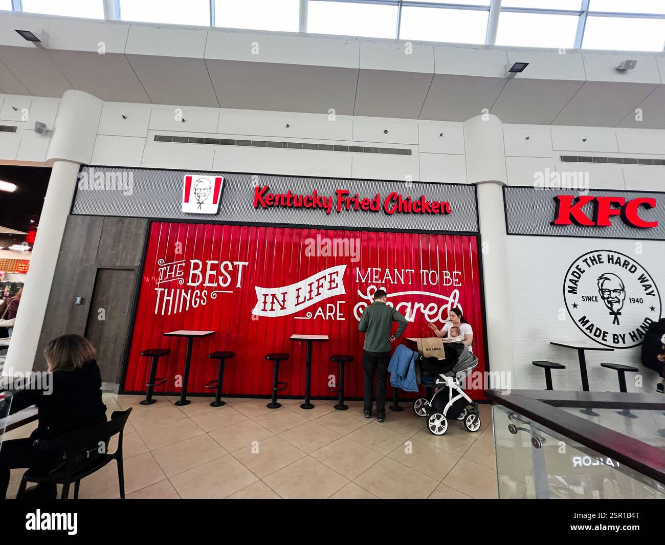 Lviv, Ukraine - February 13, 2025: Kentucky Fried Chicken restaurant with bold signage and ...