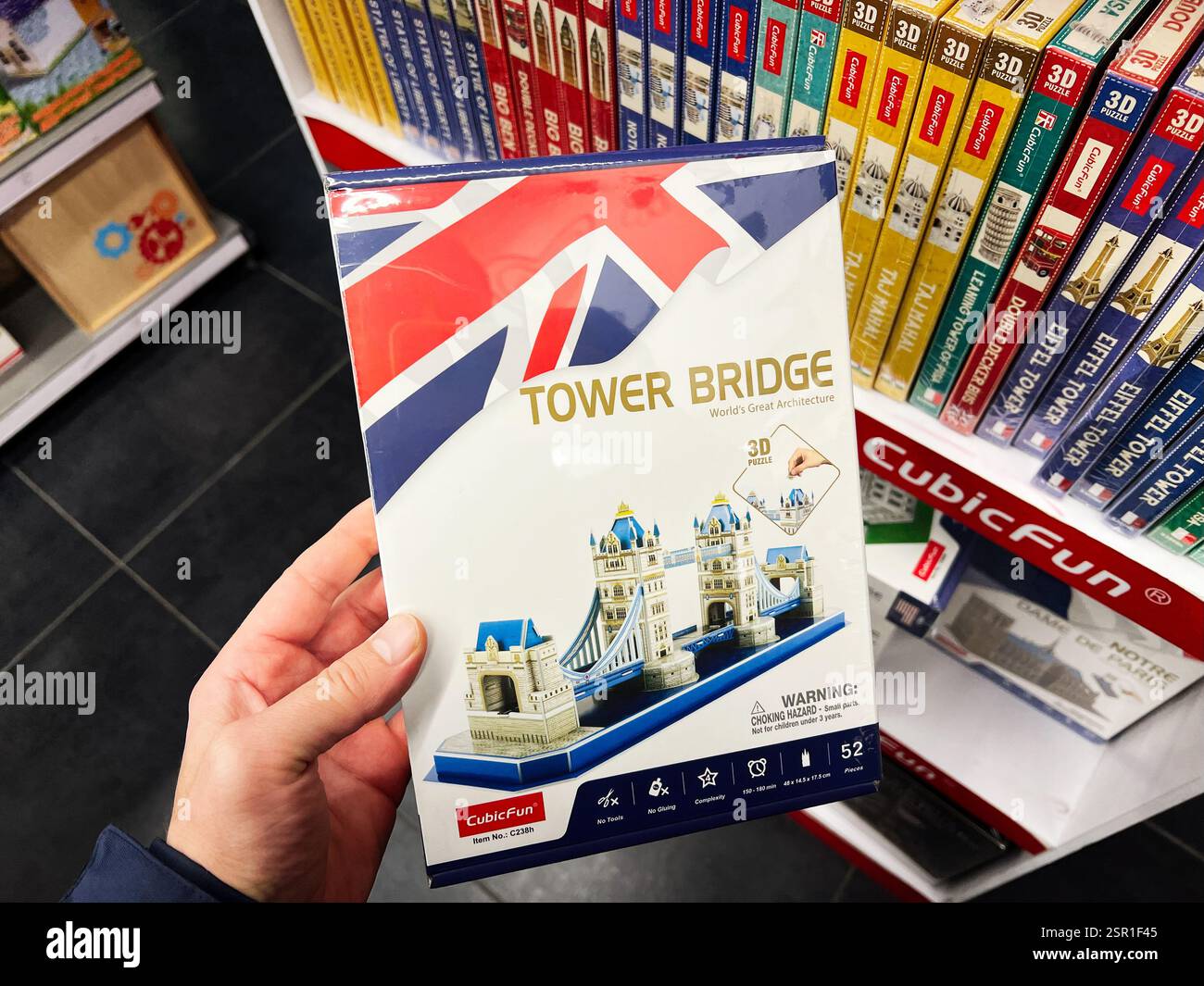 Lviv, Ukraine - February 13, 2025: A hand displays a Tower Bridge 3D ...