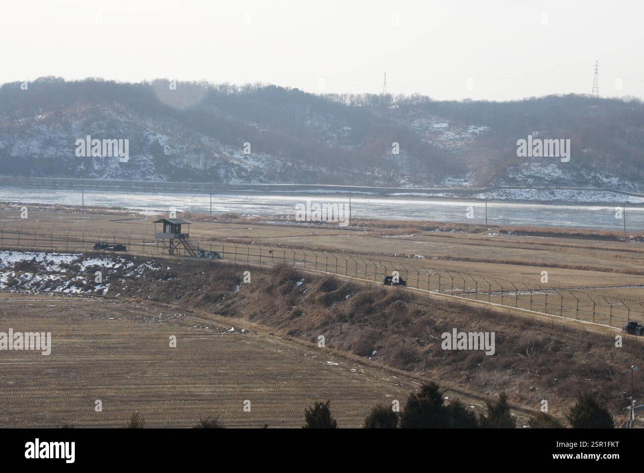 Demilitarized Zone, South Korea. Barren landscape, guard towers, barbed ...