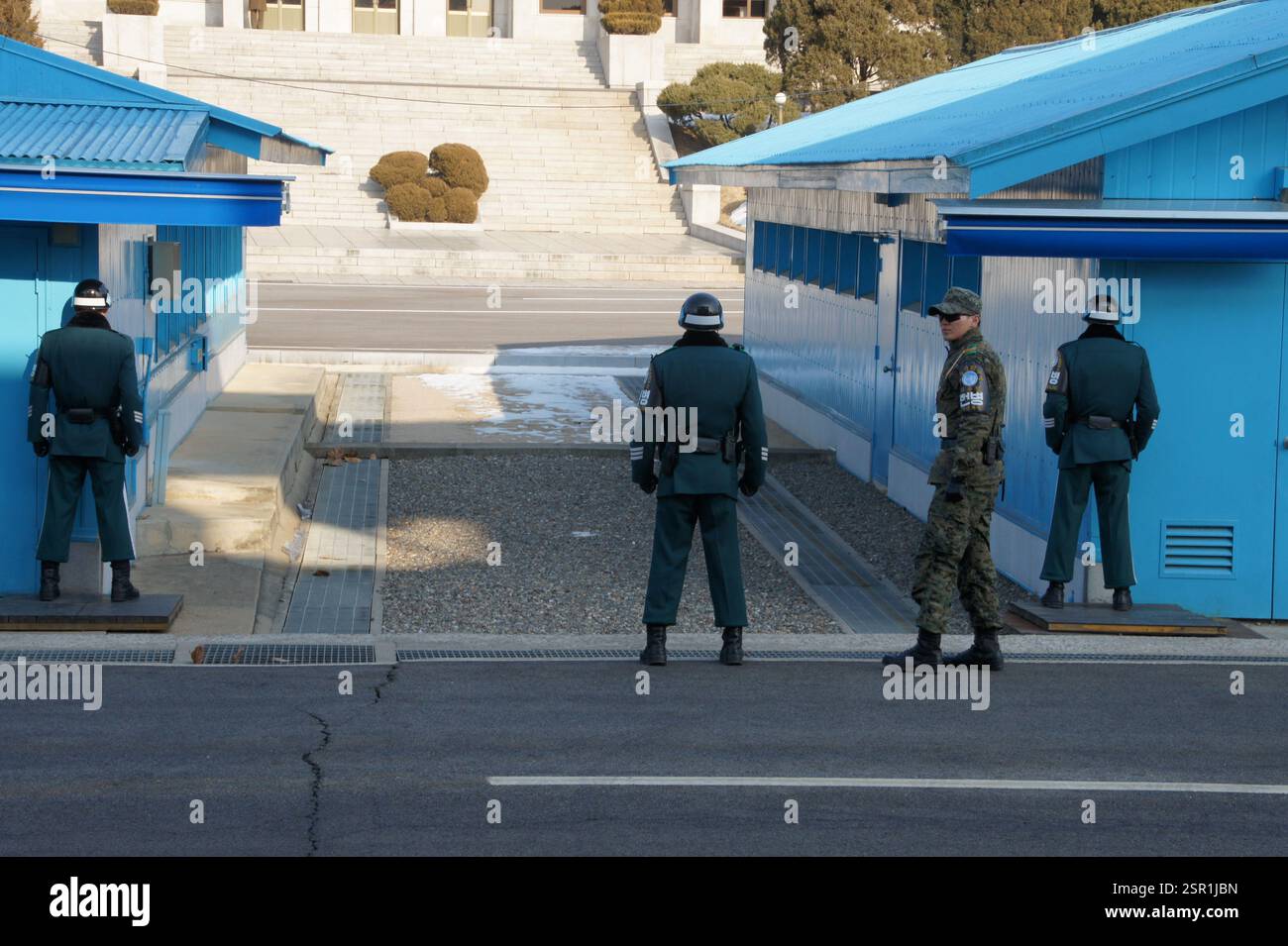 DMZ zone. Soldier in uniform guarding a building in South Korea. He ...
