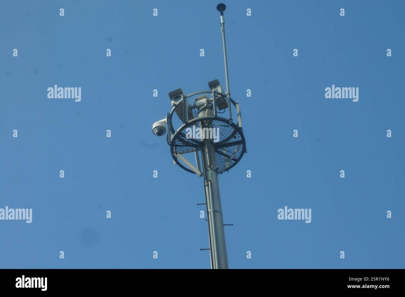 CCTV pole with multiple cameras mounted on a tall pole. Security ...