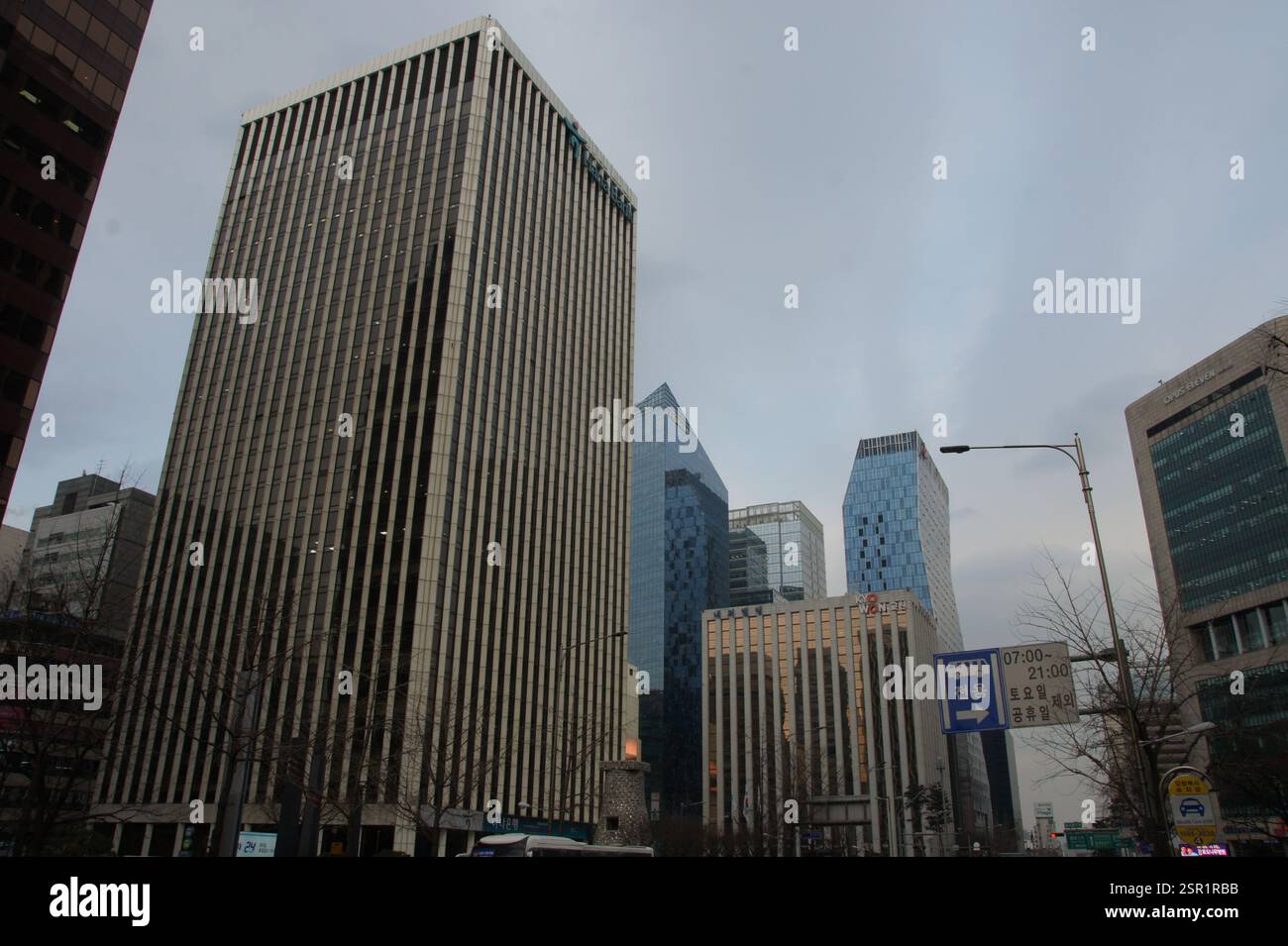 Cityscape. Skyscrapers dominate the skyline, casting long shadows ...