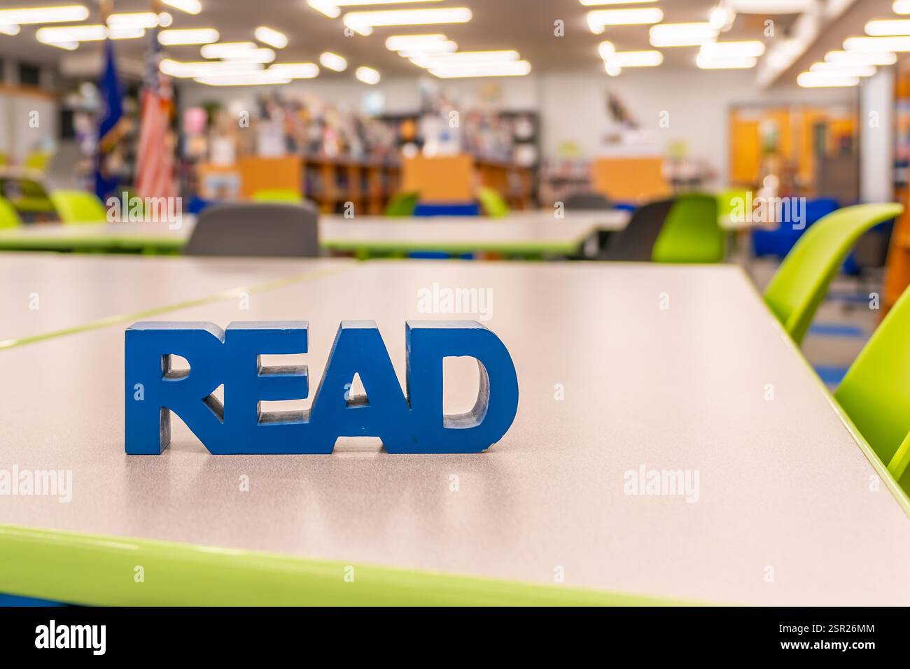 Empty school library with blue block read sign on work table Stock ...