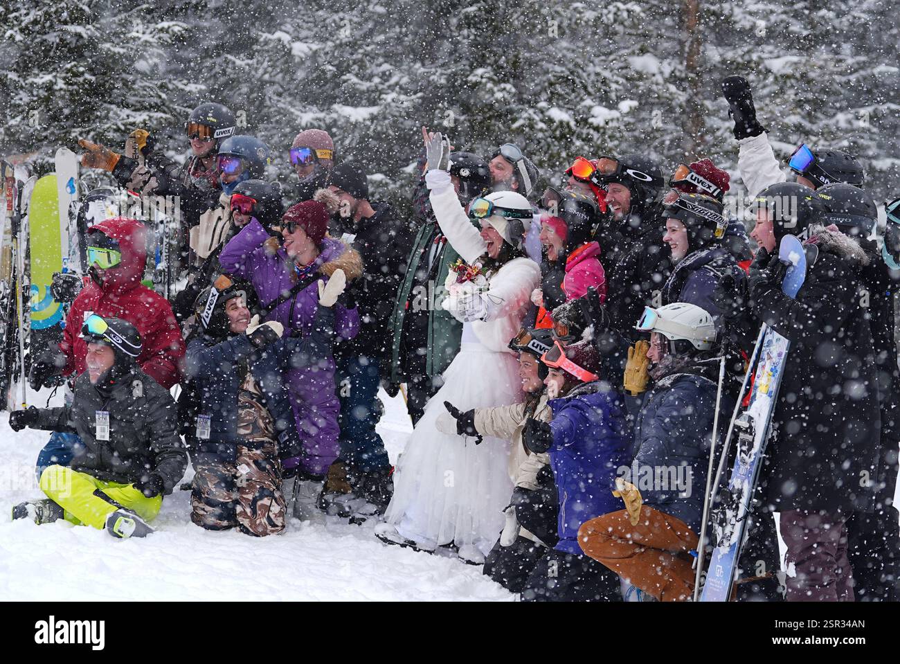 Bride Julia Wicks, center, of Minneapolis, waves as her wedding party ...