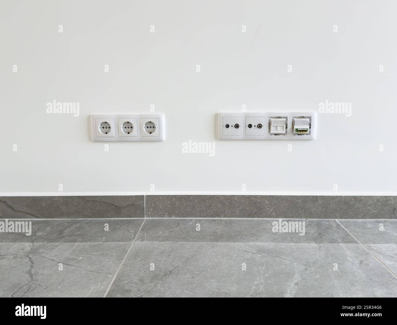 Set of power sockets and communication ports installed in a clean ...