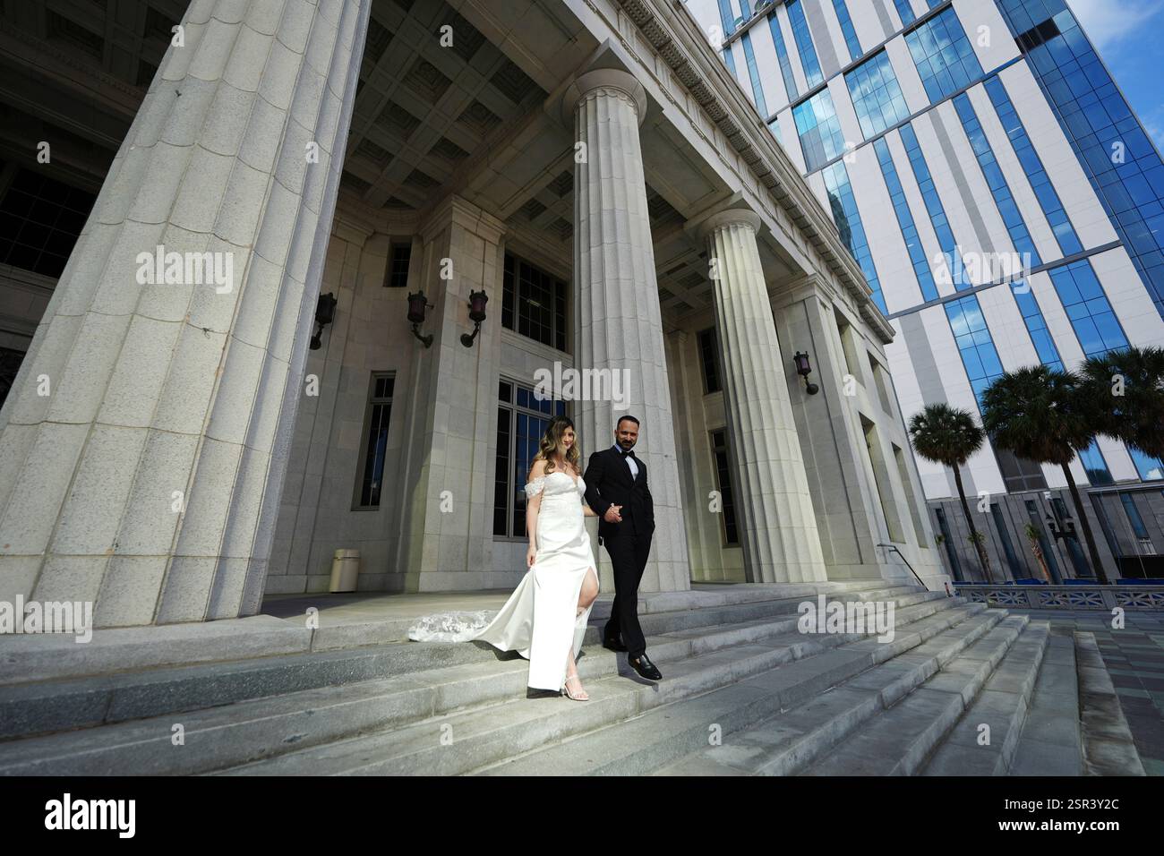 Yaiseli Figueredo, left, and Rider Simoneau descend the steps of the Dade County Courthouse in ...