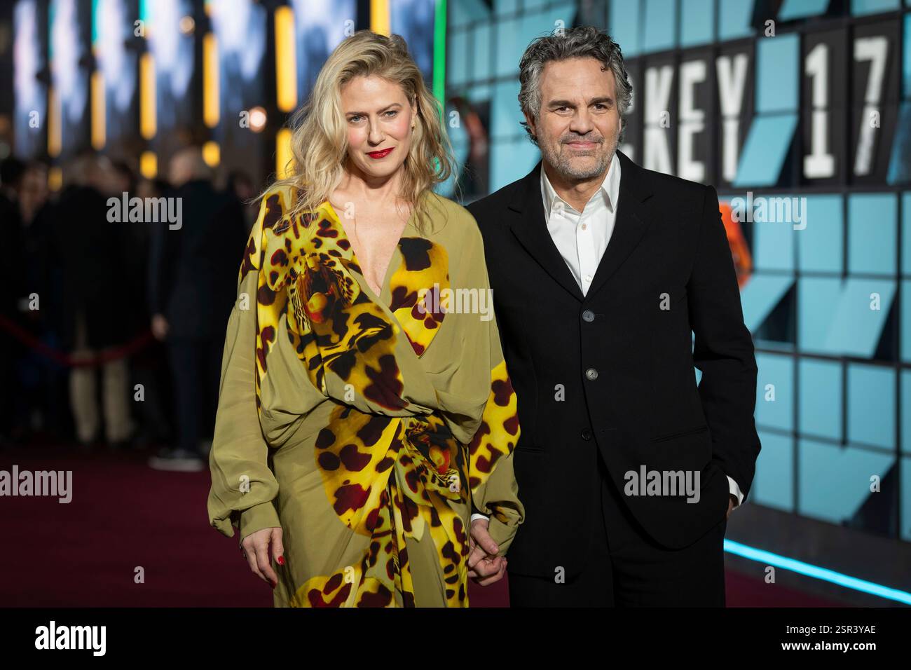 Sunrise Coigney, left, and Mark Ruffalo pose for photographers upon ...