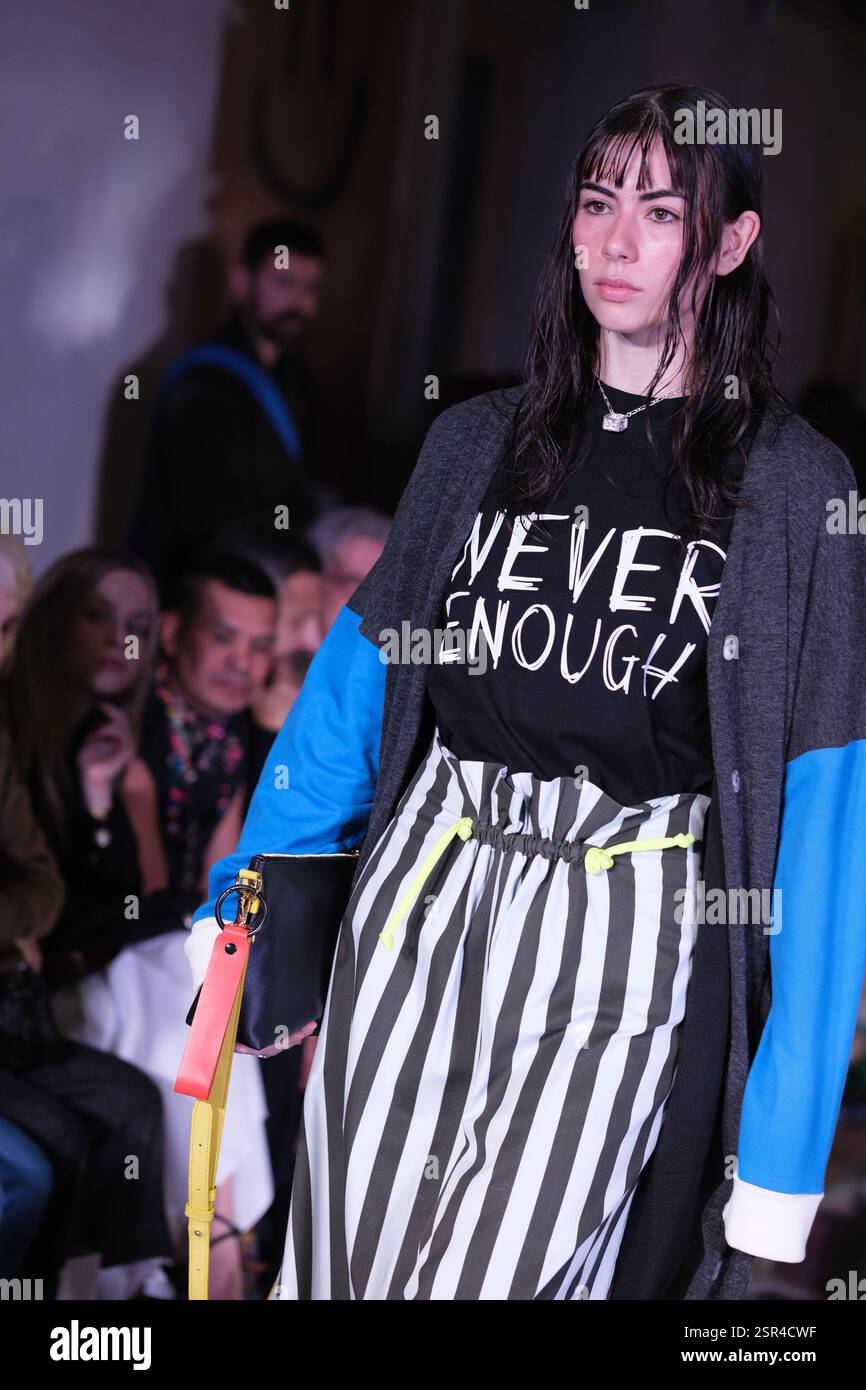 Madrid, Spain. 14th Feb, 2025. A model parades with Daniel Chong in Madrid es Moda design during ...