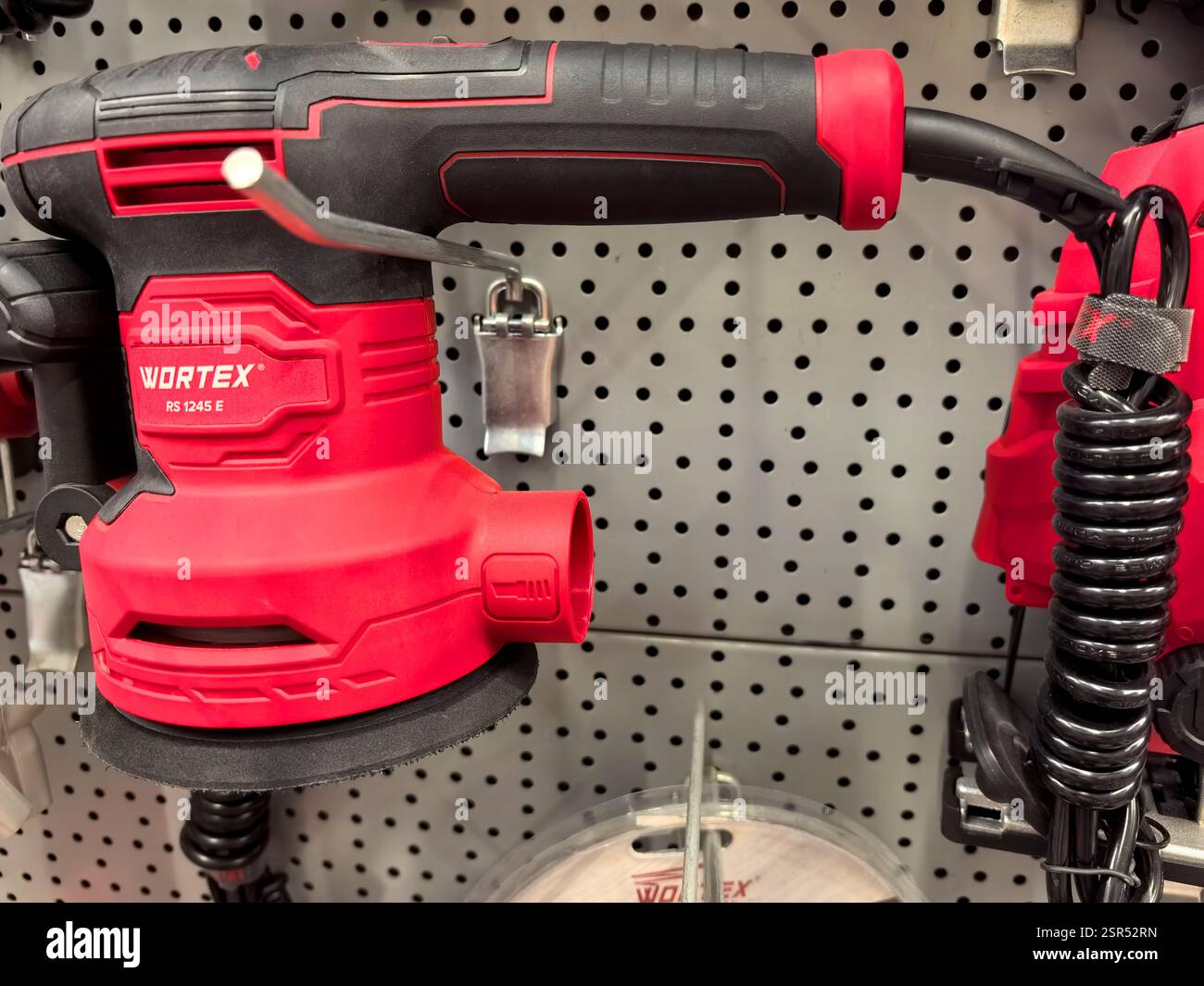 Bobruisk, Belarus - 10 February 2025: A bright red hand sander WORTEX ...