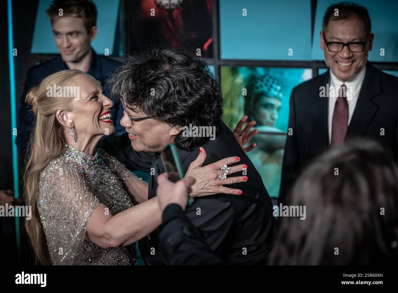 London, UK. 13th February 2025. Toni Collette is greeted by director ...