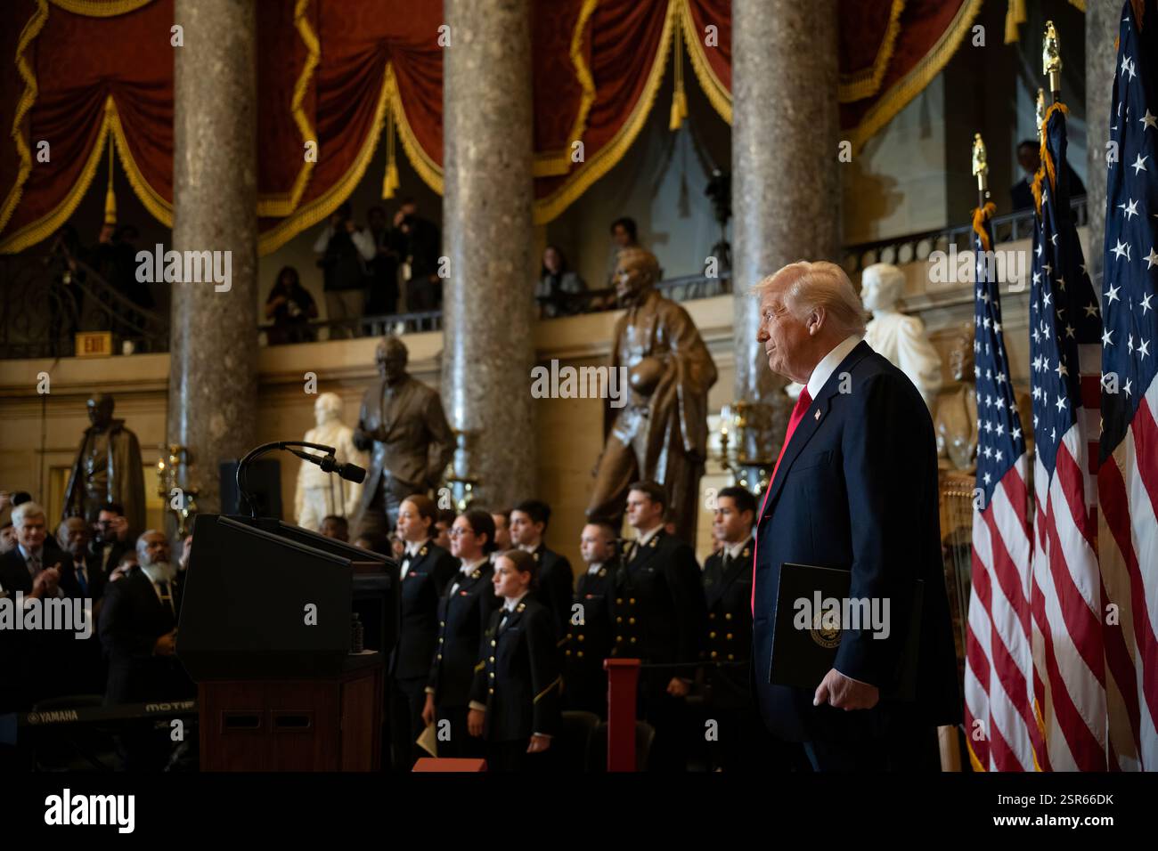 President Donald Trump attends the National Prayer Breakfast, Thursday ...