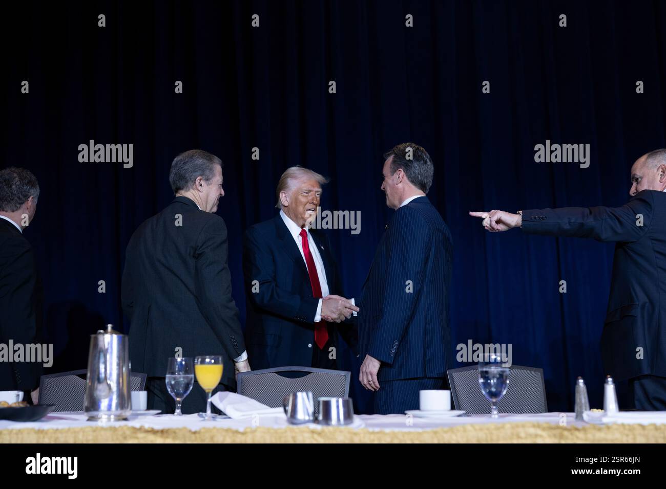 President Donald Trump attends the National Prayer Breakfast, Thursday ...