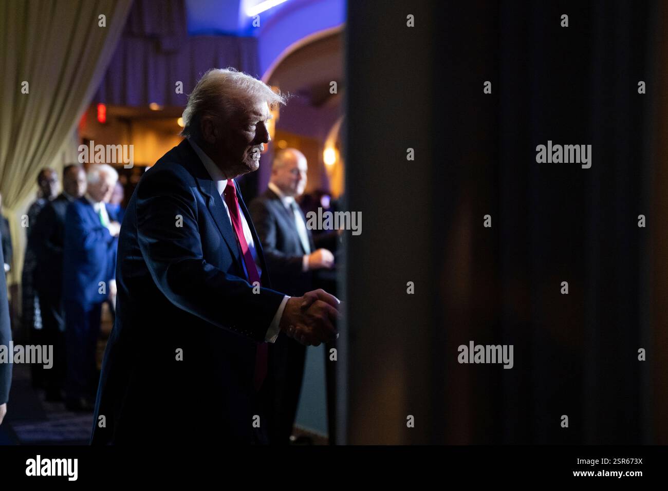 President Donald Trump attends the National Prayer Breakfast, Thursday ...