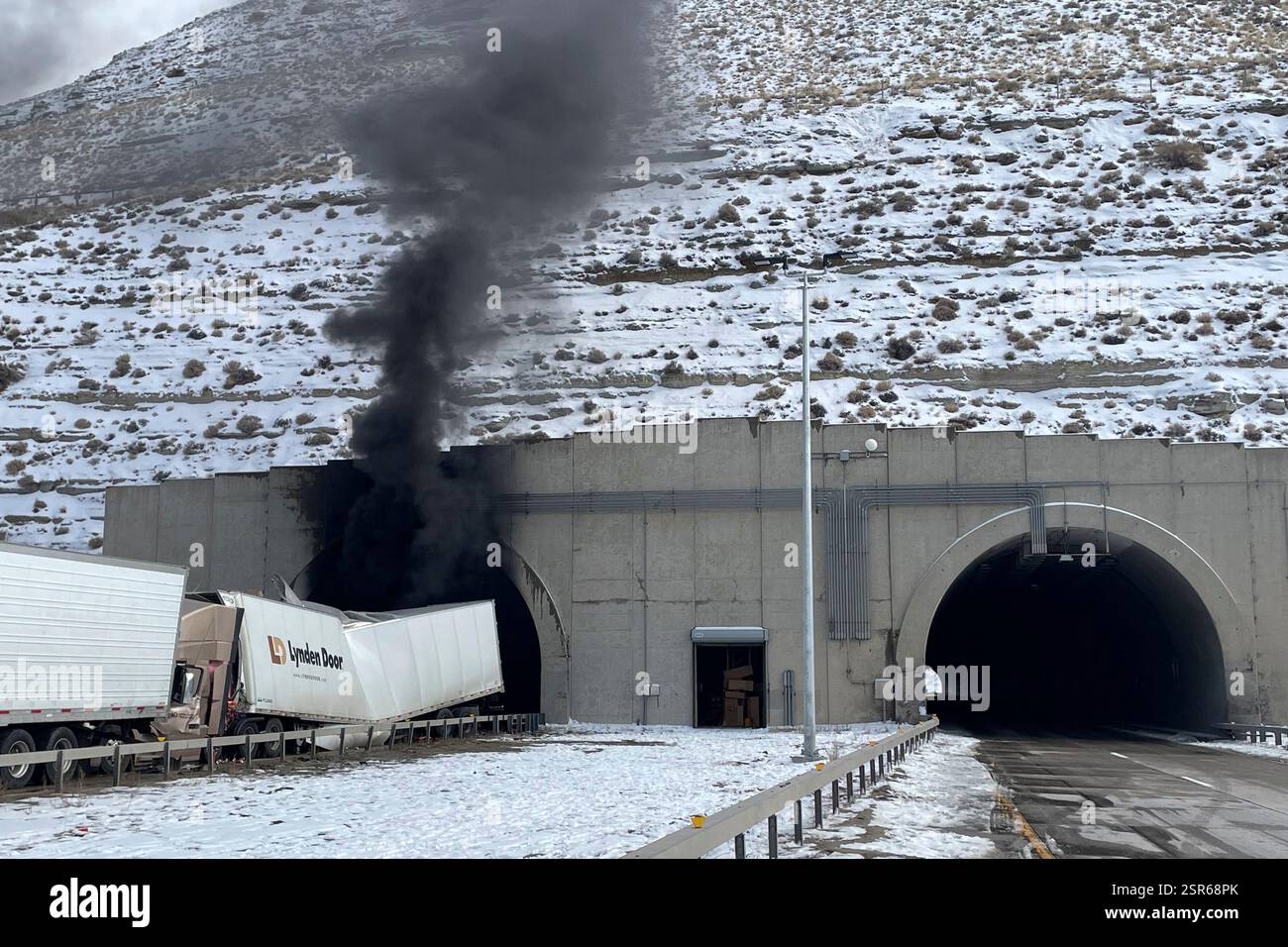 This photo provided by the Wyoming Highway Patrol shows smoke from a ...