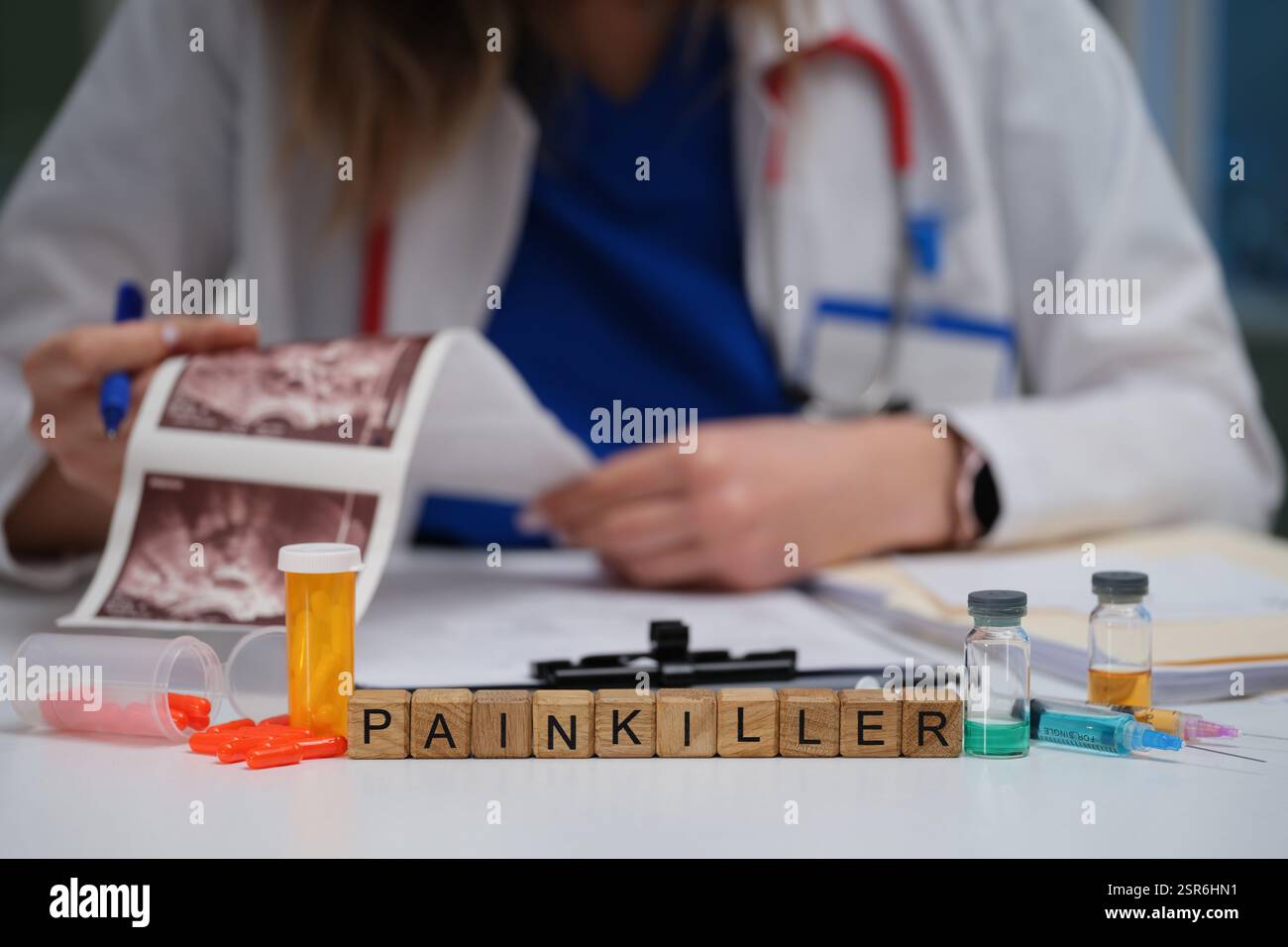 A medical professional reviews a patient report, focusing on the ...