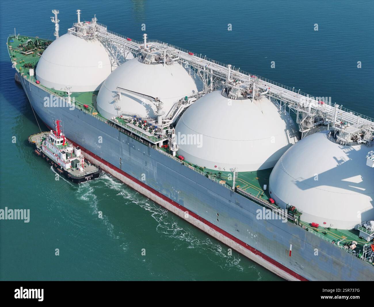 YANTAI, CHINA - FEBRUARY 14, 2025 - A large LNG (liquefied natural gas ...