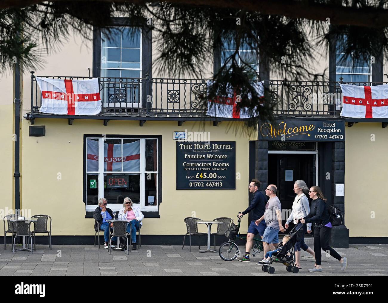 People outside the oldest section of the late 1700s built Hope Hotel on ...