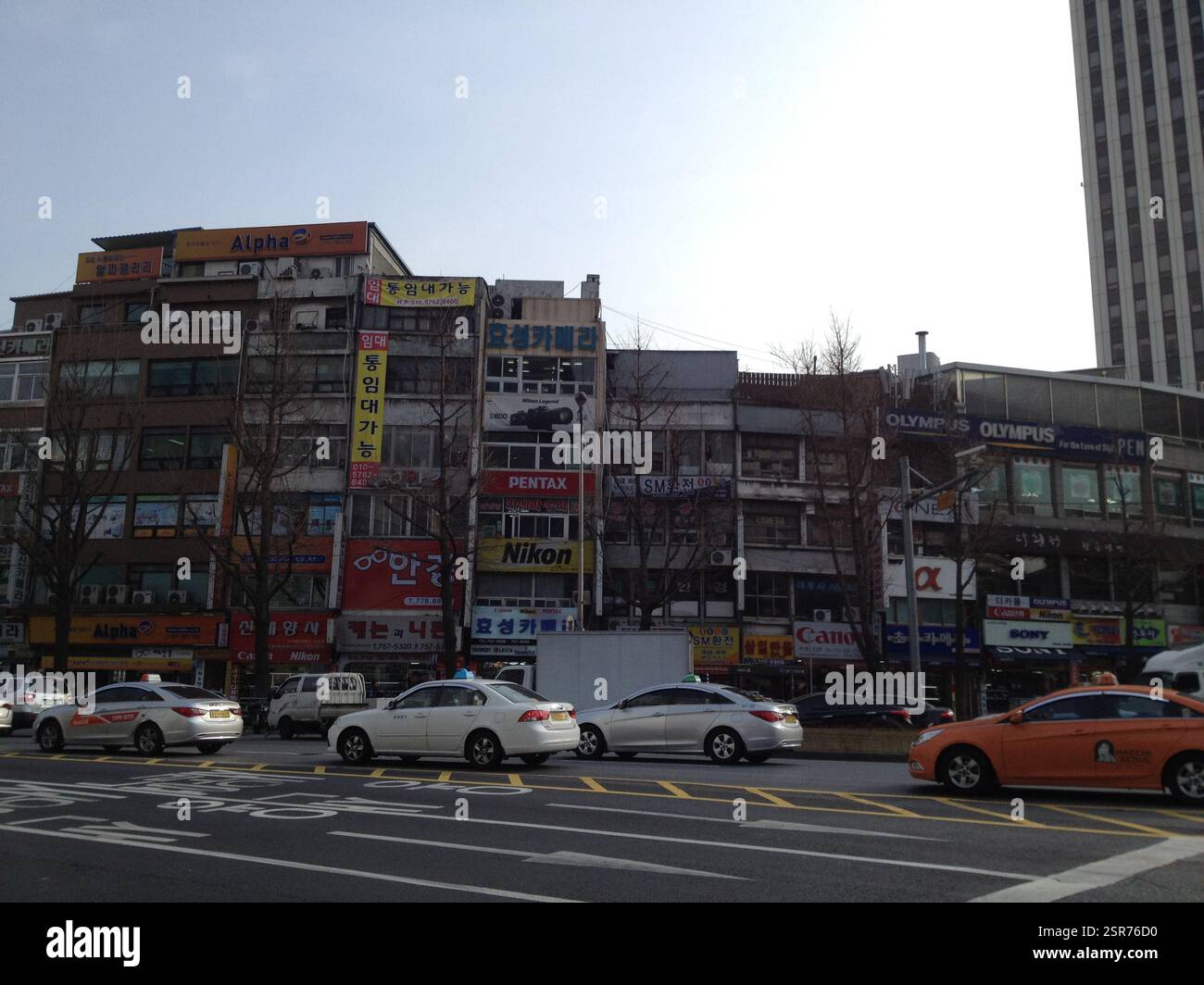 Street scene in Jongno, Seoul. Busy street with multiple buildings and ...