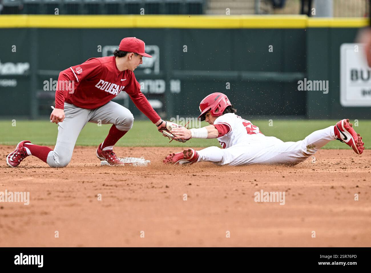 Washington State infielder Ollie Obenour tags out Arkansas baserunner ...