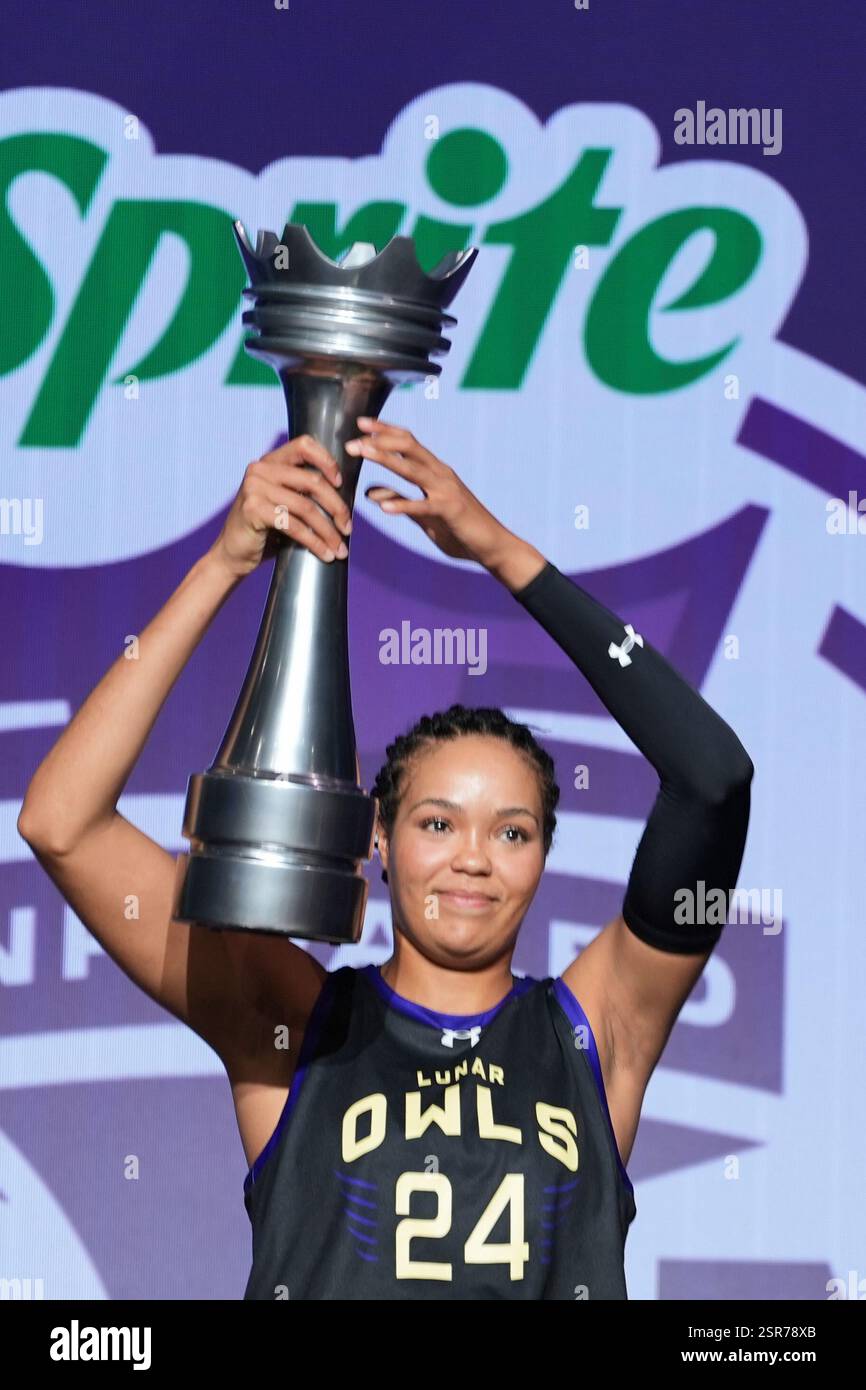 Napheesa Collier celebrates with her trophy after defeating Aaliyah ...