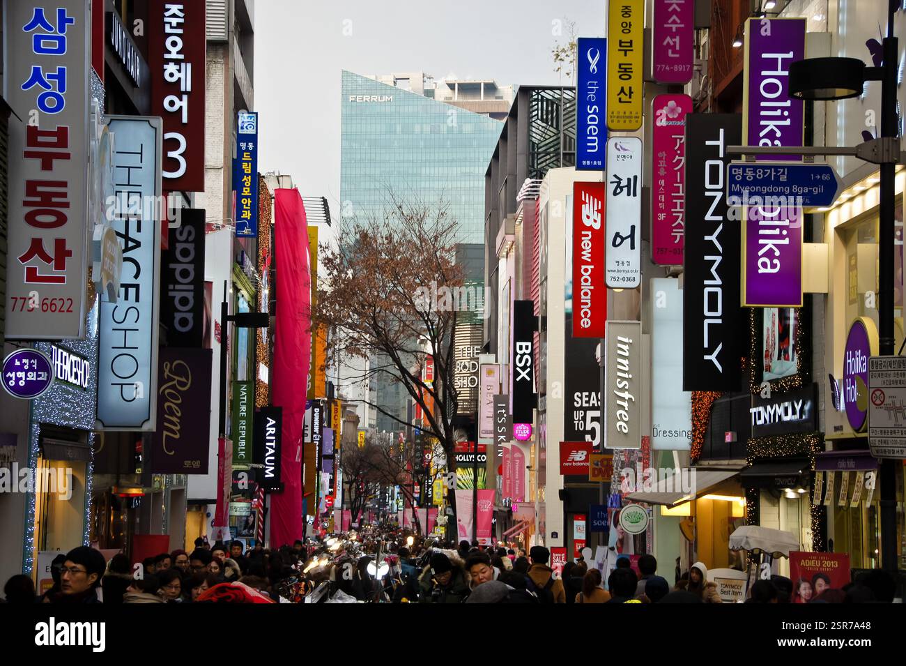 Korean street scene. Multiple storefronts with diverse signage. Vibrant ...