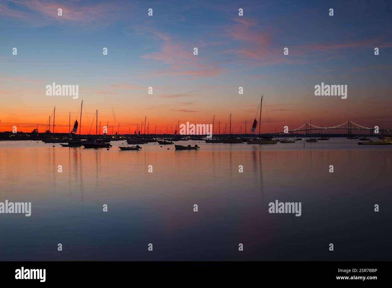The Sailboats at a marina and the beautiful sunset in the shore of ...