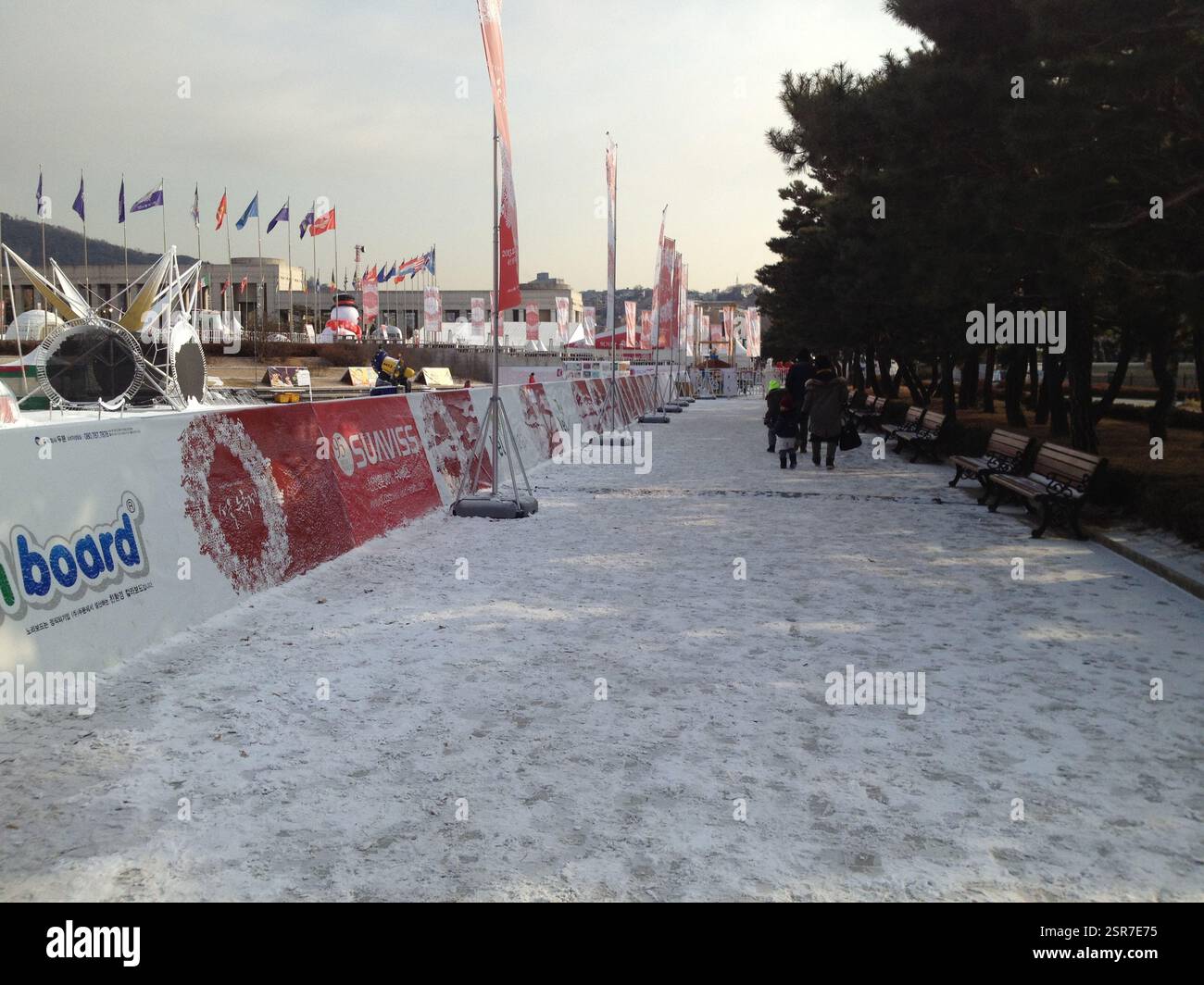 Outdoor ice rink in South Korea with snow on the ground and people ...