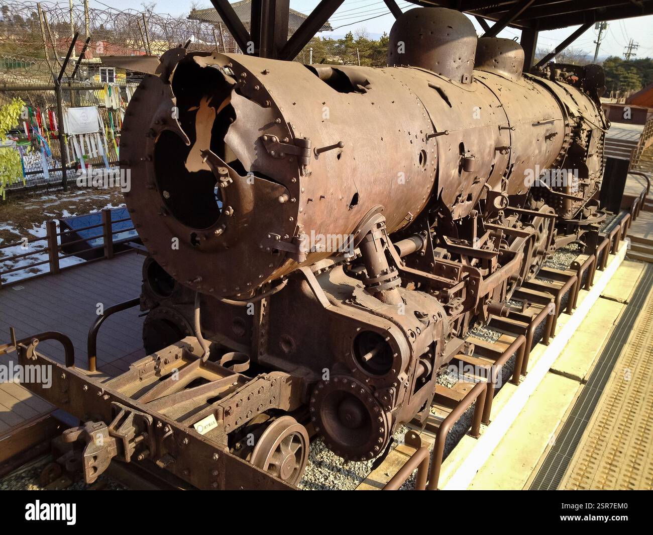 The train is old and weathered, with a worn paint job and a vintage ...
