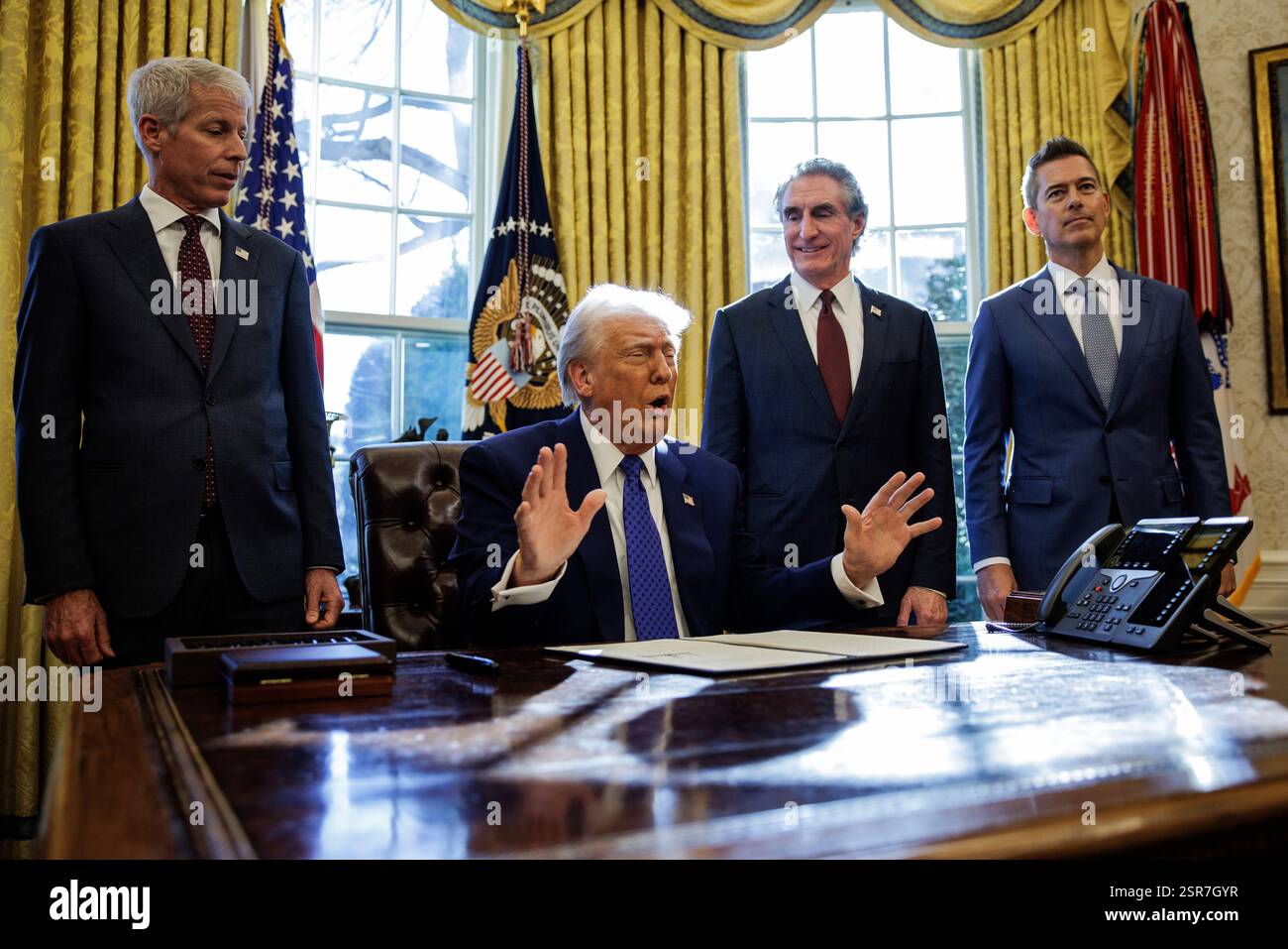 United States President Donald Trump speaks while signing two Executive ...