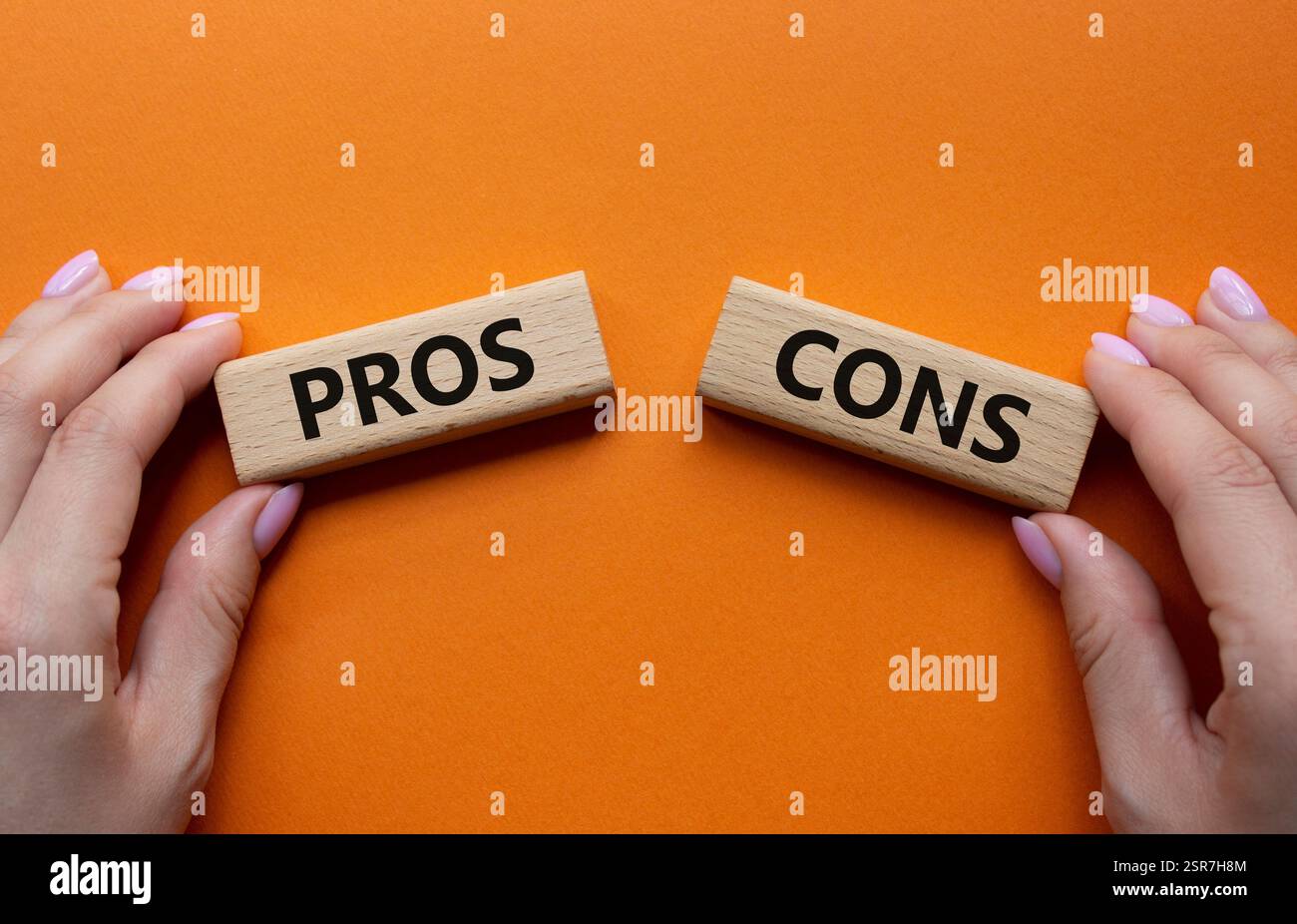 Pros vs Cons symbol. Concept word Pros vs Cons on wooden blocks ...