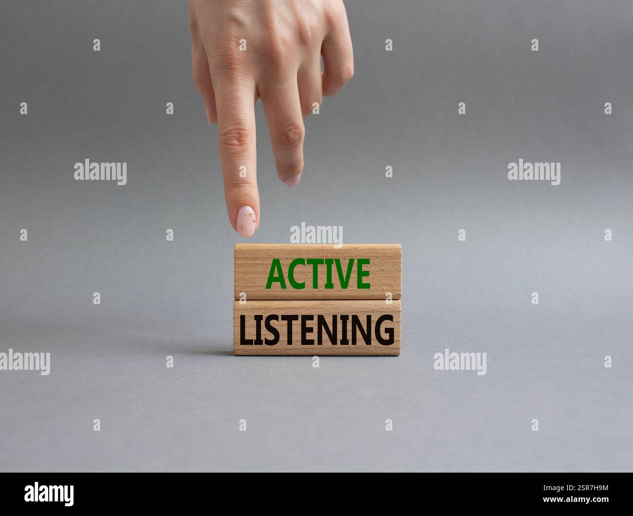 Active listening symbol. Wooden blocks with words Active listening ...