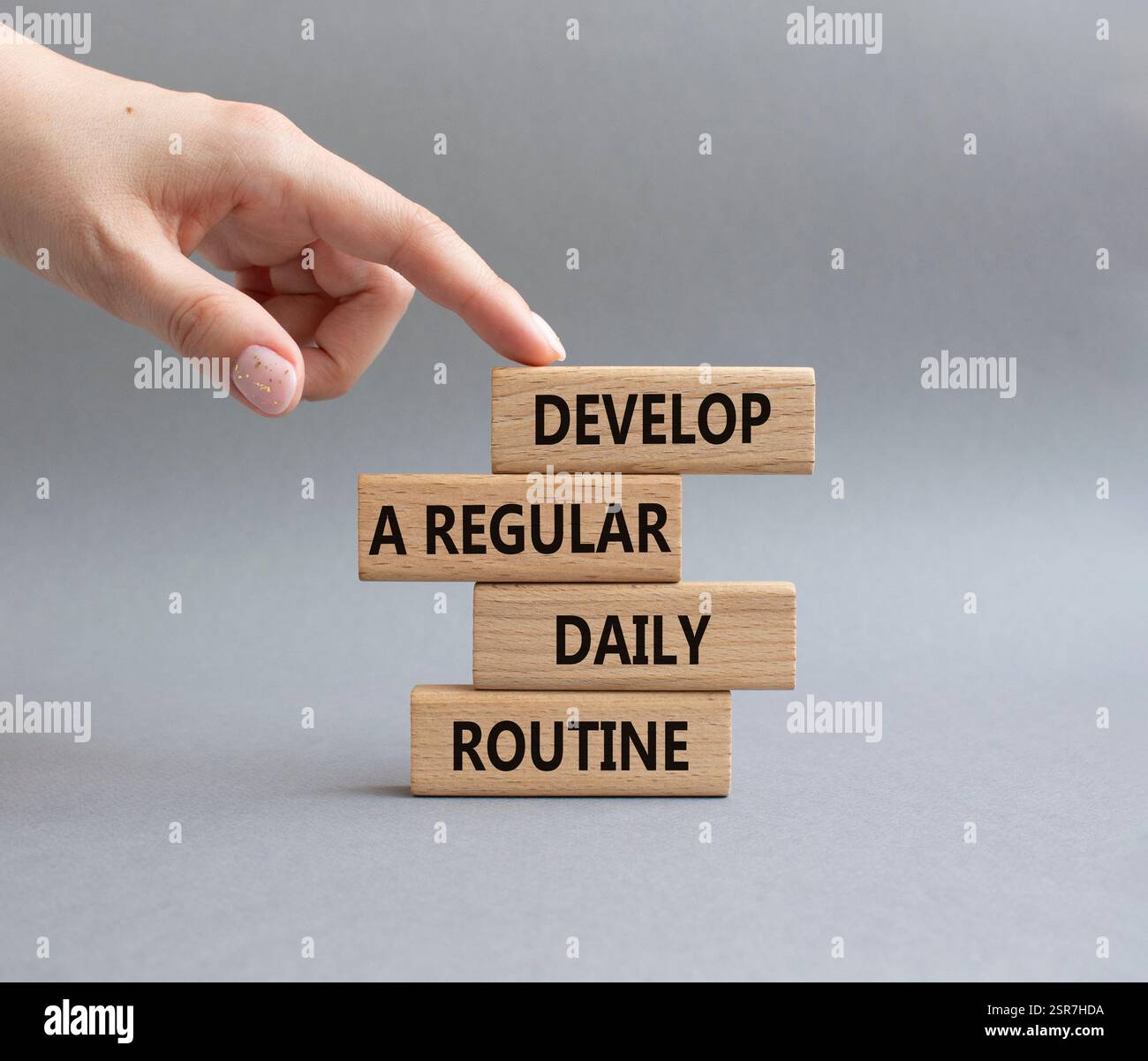 Develop a regular daily routine symbol. Concept words Develop a regular ...