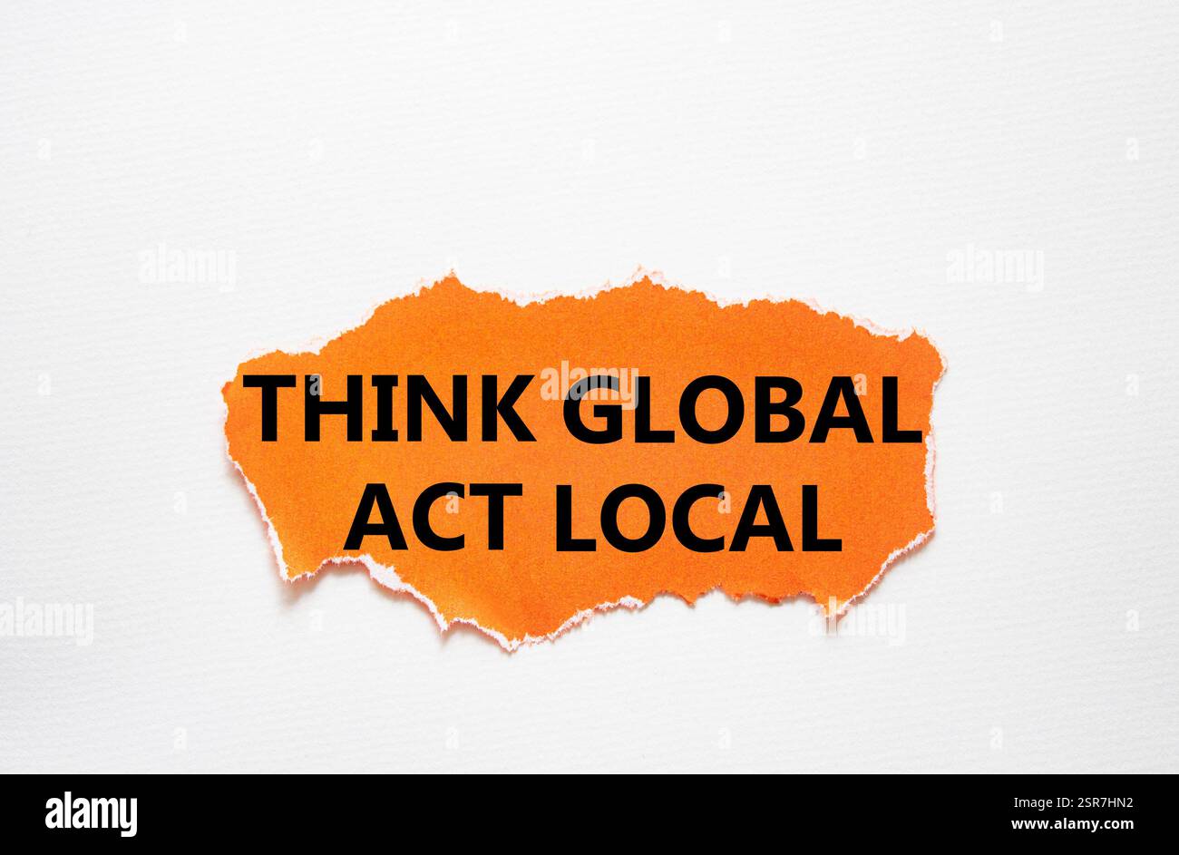 Think global act local symbol. Torn orange paper with words Think ...