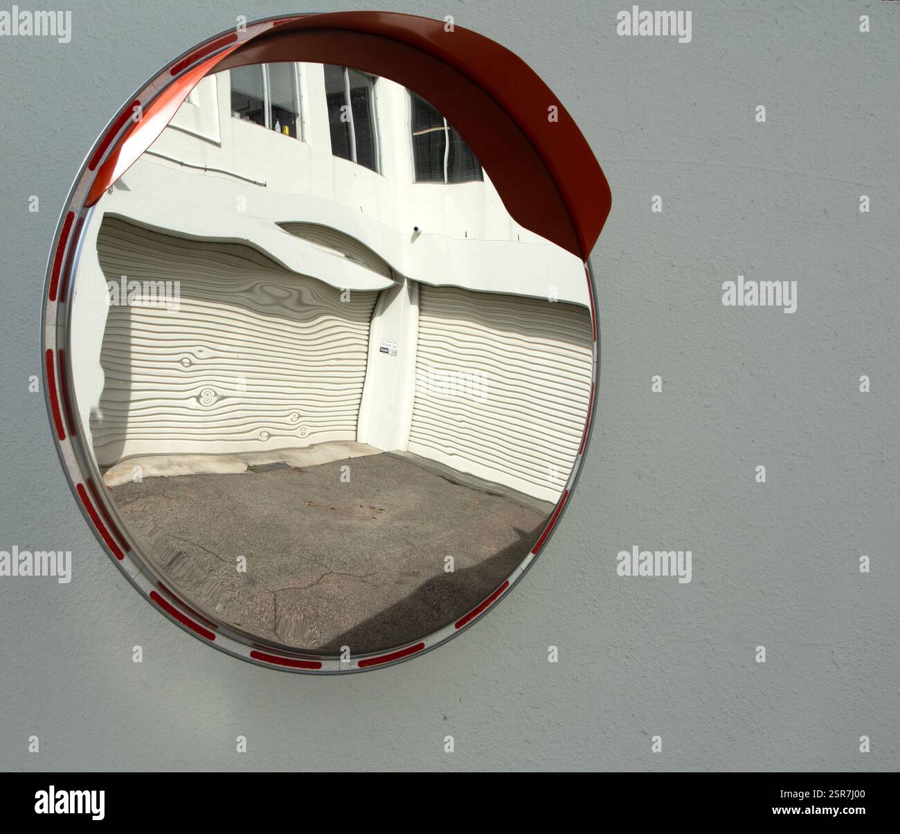 Convex traffic mirror in a parking area Stock Photo - Alamy