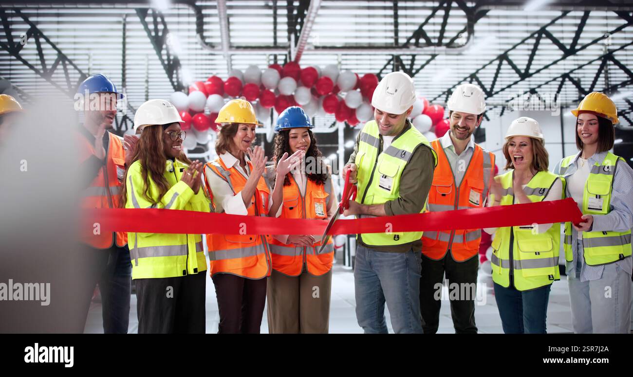 Celebrating ribbon cutting in hi-res stock photography and images - Alamy