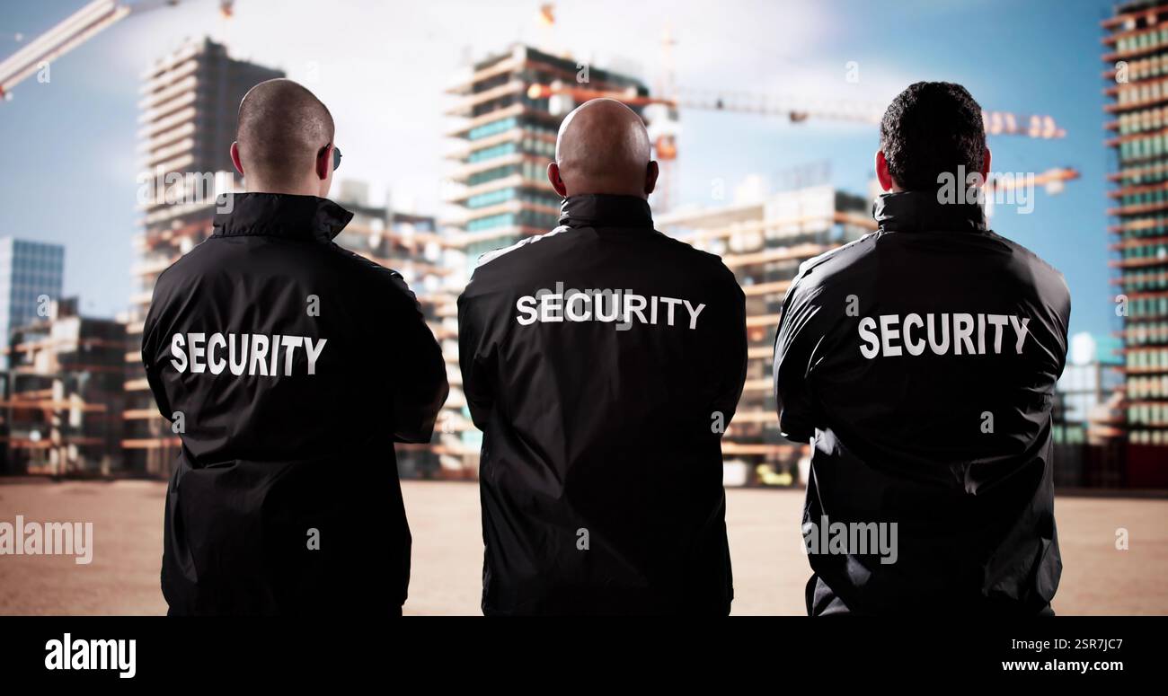 Multiracial Security Guards Ensure Building Construction Safety In City ...