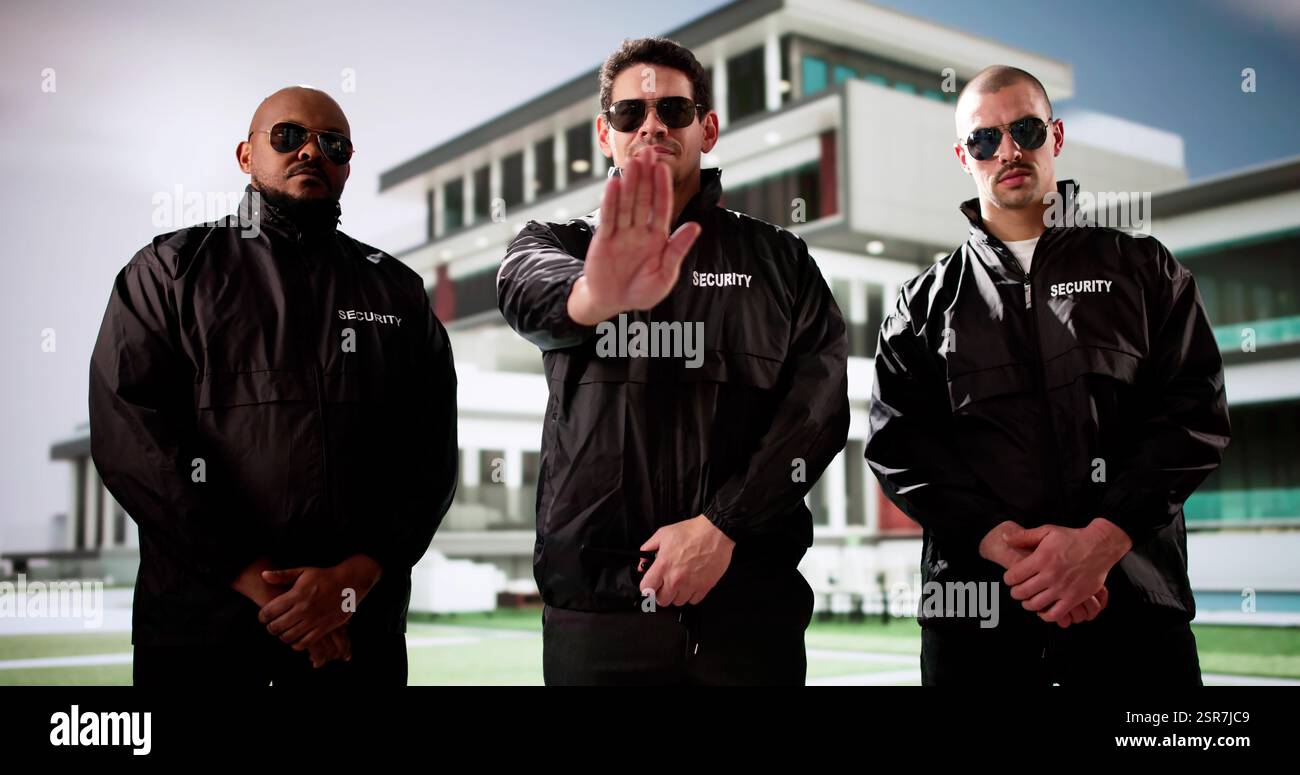 Security Guard Gives Stop Gesture In Front Of Apartment Building ...