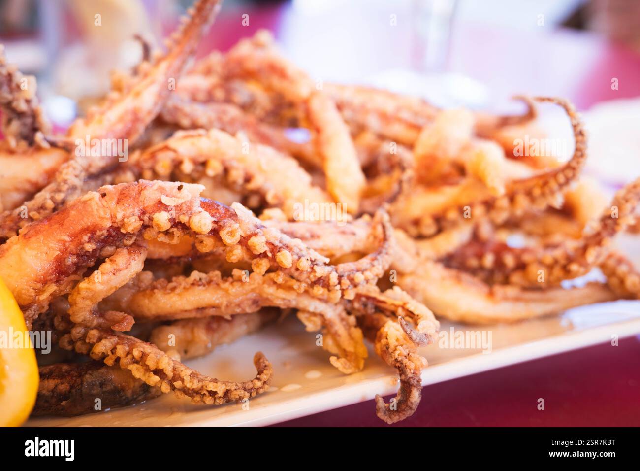 Crispy Fried Octopus Served on a Platter Stock Photo - Alamy