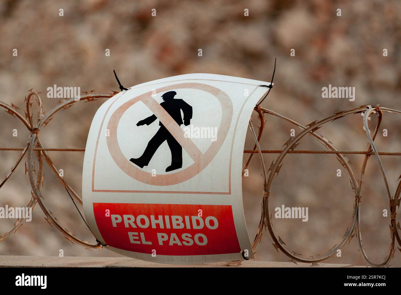 No Entry Sign on Barbed Wire Fence Stock Photo - Alamy