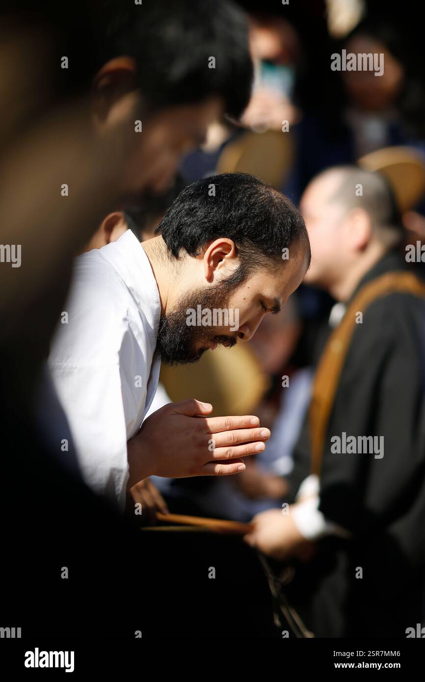 February 15, 2025, Tokyo, Japan: Devotees of the Nichiren sect, dressed ...