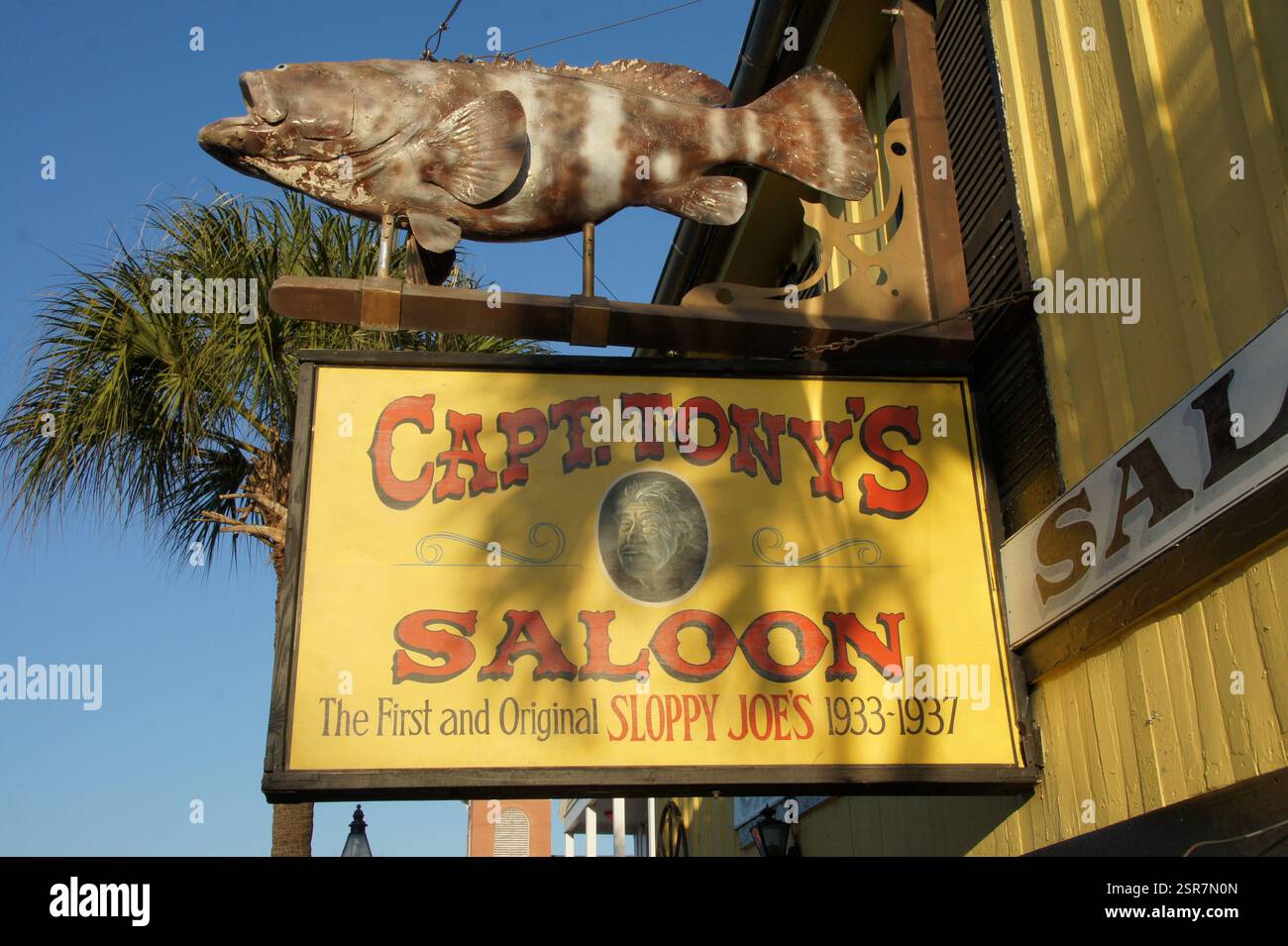 Captain Tony's Saloon sign with a large fish sculpture dominates the ...