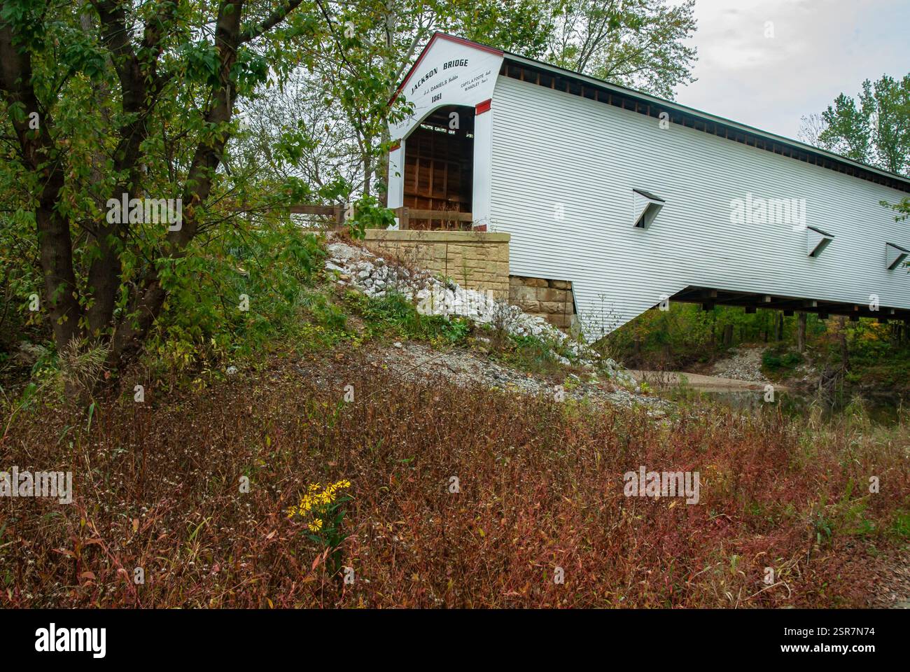 The Jackson Covered Bridge over Sugar Creek in Parke County, Indiana is ...
