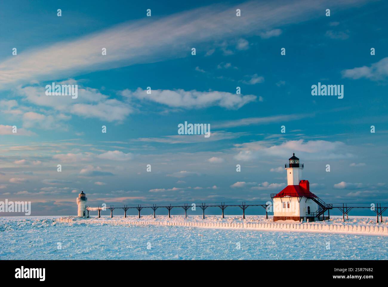 The St. Joseph, Michigan Pierhead light and Lighthouse are frozen in ...