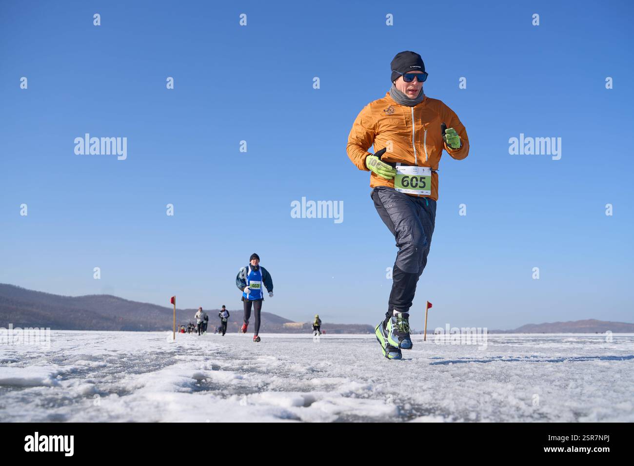 Vladivostok, Russia. 15th Feb, 2025. Runners participate in the "Ice ...