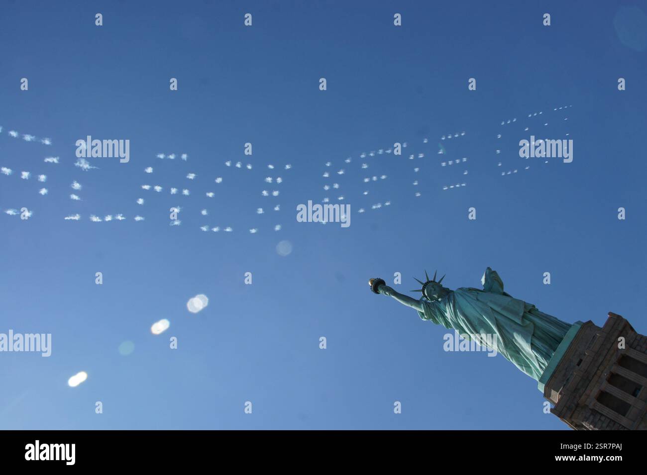 A close-up of the Statue of Liberty's weathered copper face in New York ...