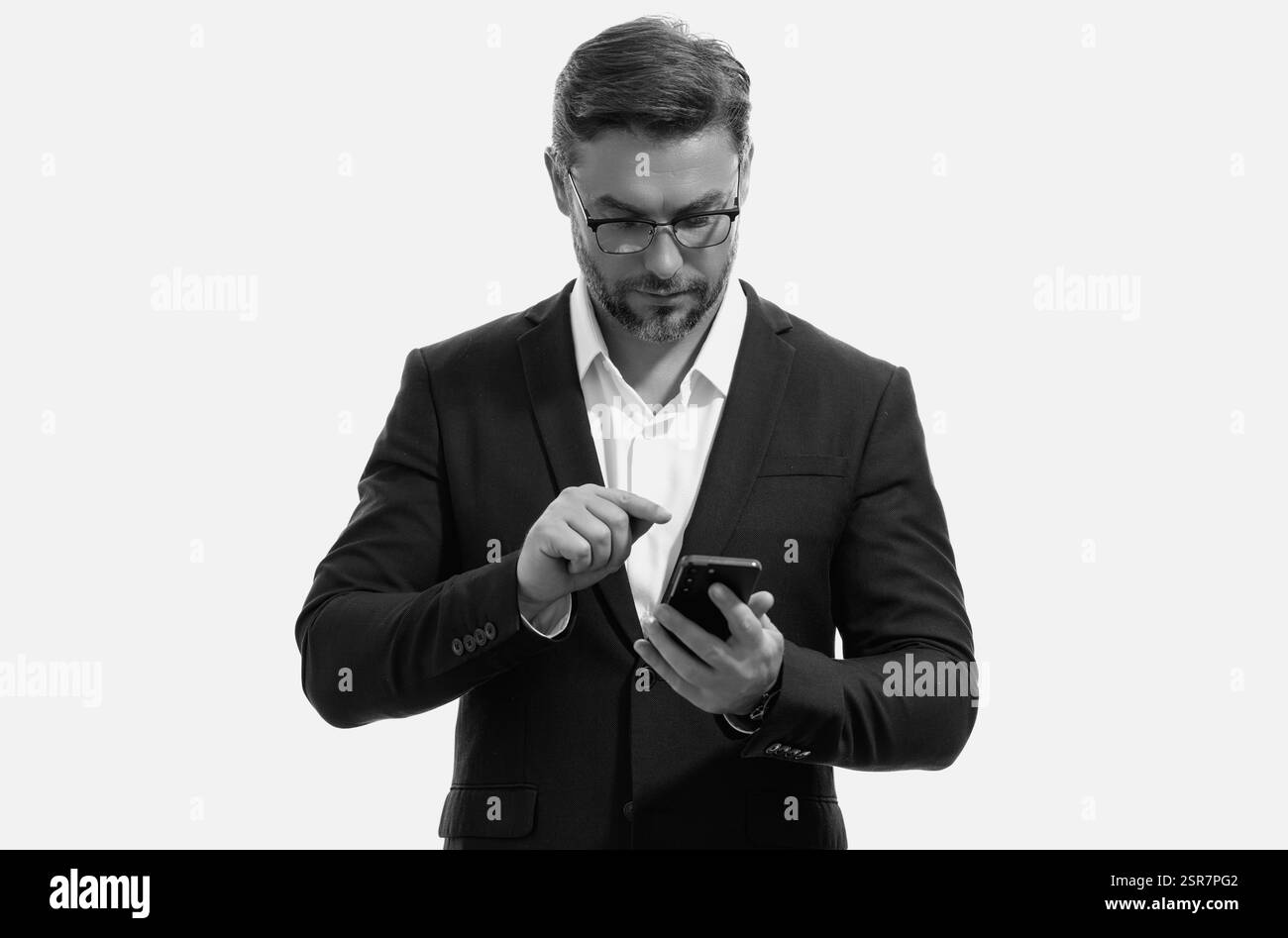 Business man in business suit using smart phone. Portrait attractive ...